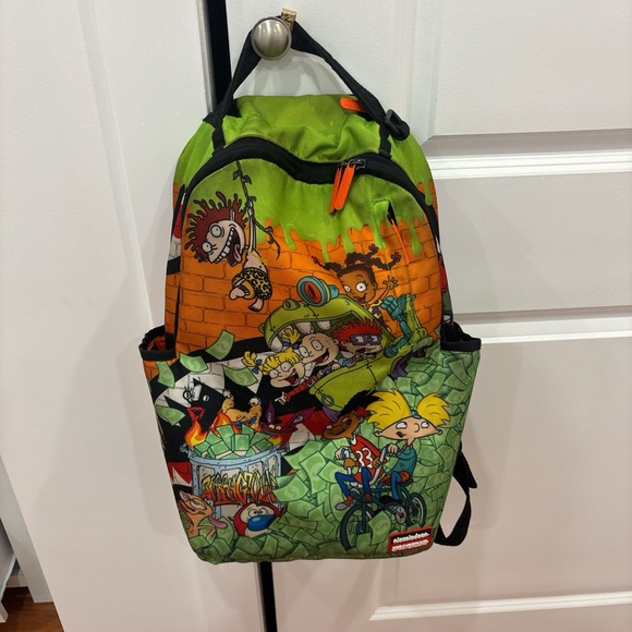 Sprayground | Bags | Sprayground Green And Orange Cartoon Backpack ...
